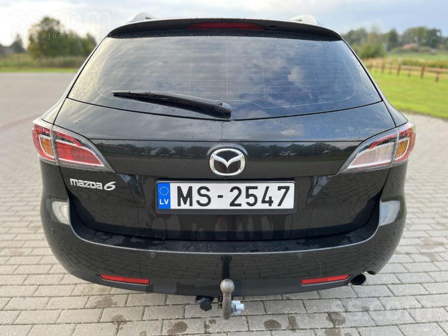 Black Mazda 6 2009 in Riga, with an engine capacity of 2.00 L and mileage of 238 thousand km for 3500 €, photo 8 on AUTOMOTO.COM.LV