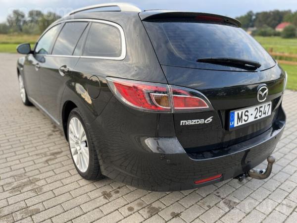 Black Mazda 6 2009 in Riga, with an engine capacity of 2.00 L and mileage of 238 thousand km for 3500 €, photo 8 on AUTOMOTO.COM.LV