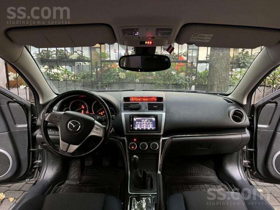 Black Mazda 6 2009 in Riga, with an engine capacity of 2.00 L and mileage of 238 thousand km for 3500 €, photo 10 on AUTOMOTO.COM.LV