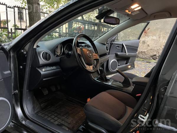 Black Mazda 6 2009 in Riga, with an engine capacity of 2.00 L and mileage of 238 thousand km for 3500 €, photo 10 on AUTOMOTO.COM.LV