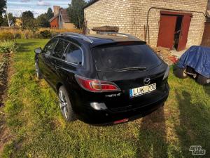 Black Mazda 6 2009 in Siauliai, with an engine capacity of 2.20 L and mileage of 284 thousand km for 950 €, photo 6 on AUTOMOTO.COM.LV