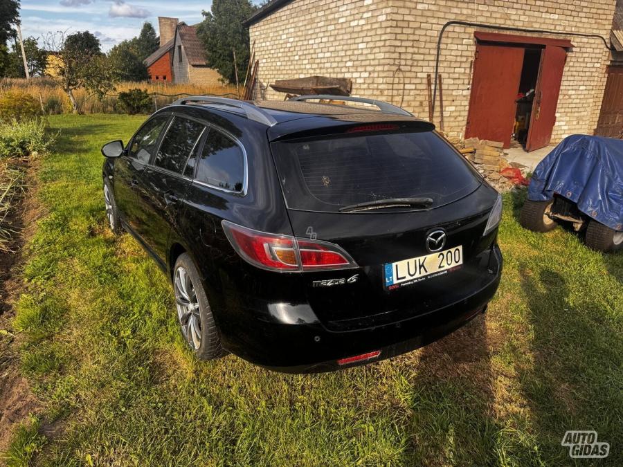 Black Mazda 6 2009 in Siauliai, with an engine capacity of 2.20 L and mileage of 284 thousand km for 950 €, photo 6 on AUTOMOTO.COM.LV