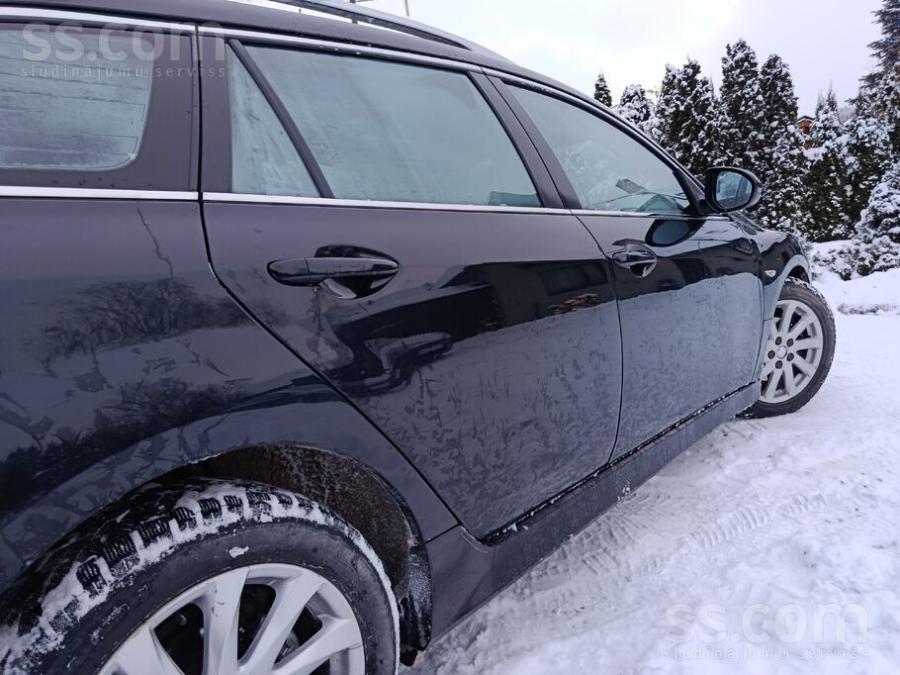 Melns Mazda 6 2010 Rīga, ar dzinēja tilpumu 2.20 L un nobraukumu 315 tūkst. km par 2000 €, foto 12 vietnē AUTOMOTO.COM.LV