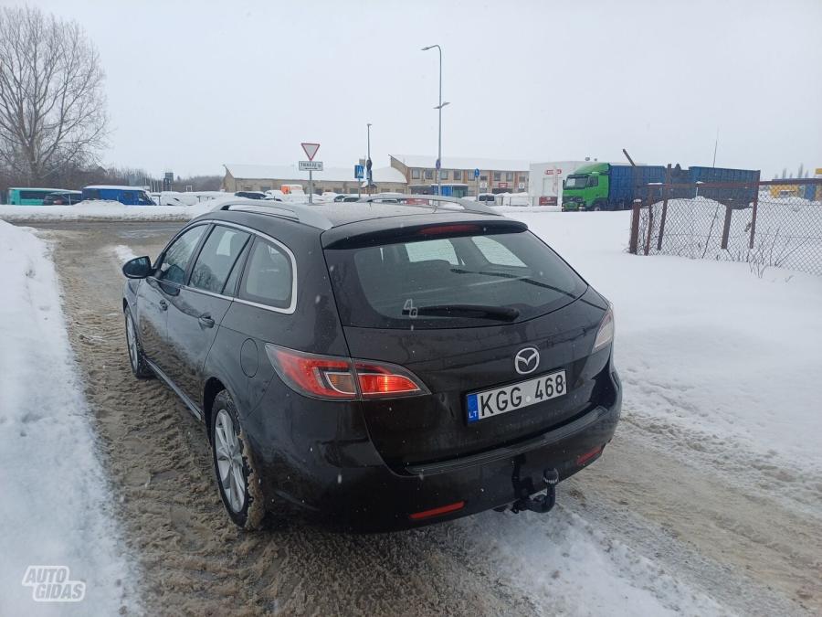 Black Mazda 6 2010 in Kretinga, with an engine capacity of 2.20 L and mileage of 353 thousand km for 2290 €, photo 5 on AUTOMOTO.COM.LV