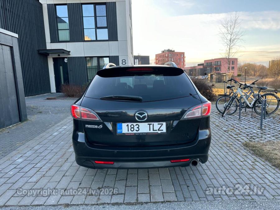 Black Mazda 6 2010 in Tartu, with an engine capacity of 2.20 L and mileage of 273 thousand km for 2999 €, photo 6 on AUTOMOTO.COM.LV