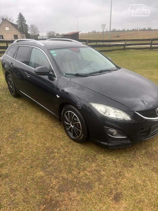 Black Mazda 6 2010 in Vilnius, with an engine capacity of 2.20 L and mileage of 290 thousand km for 1250 €, photo 1 on AUTOMOTO.COM.LV