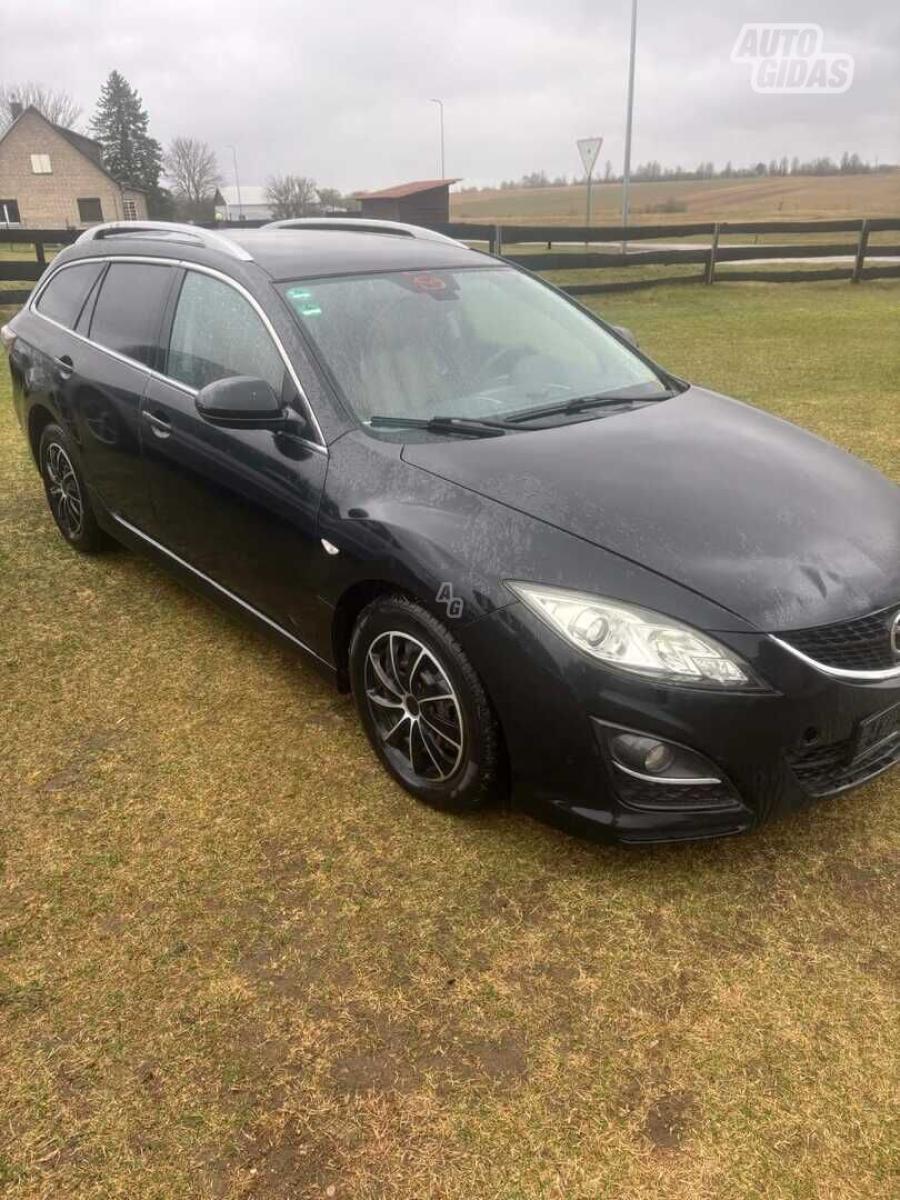 Black Mazda 6 2010 in Vilnius, with an engine capacity of 2.20 L and mileage of 290 thousand km for 1250 €, photo 1 on AUTOMOTO.COM.LV