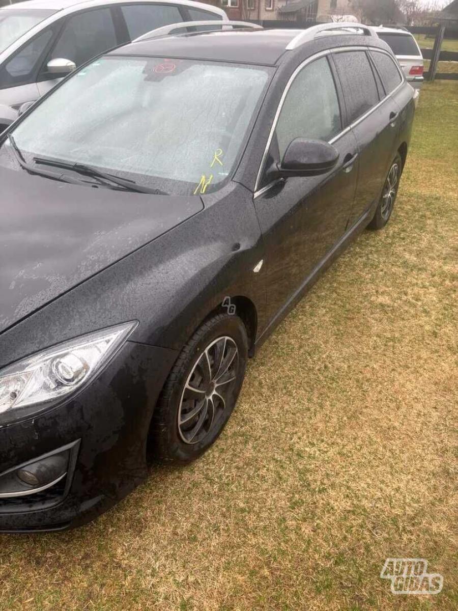 Black Mazda 6 2010 in Vilnius, with an engine capacity of 2.20 L and mileage of 290 thousand km for 1250 €, photo 3 on AUTOMOTO.COM.LV
