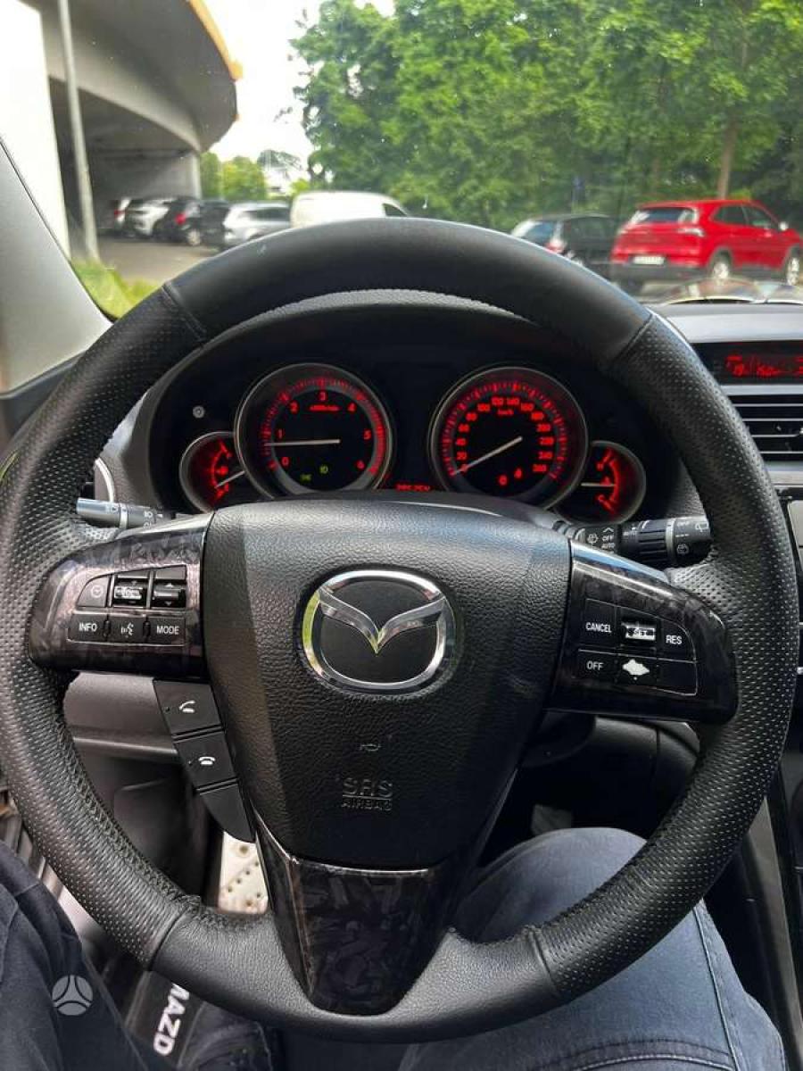 Black Mazda 6 2010 in Kaunas, with an engine capacity of 2.18 L and mileage of 296 thousand km for 2500 €, photo 9 on AUTOMOTO.COM.LV