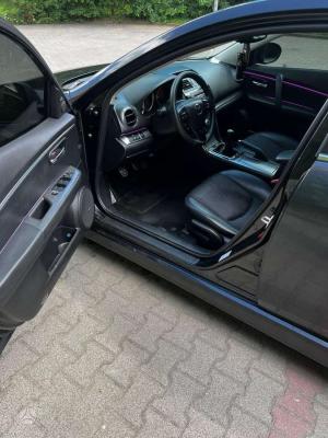 Black Mazda 6 2010 in Kaunas, with an engine capacity of 2.18 L and mileage of 296 thousand km for 2500 €, photo 10 on AUTOMOTO.COM.LV
