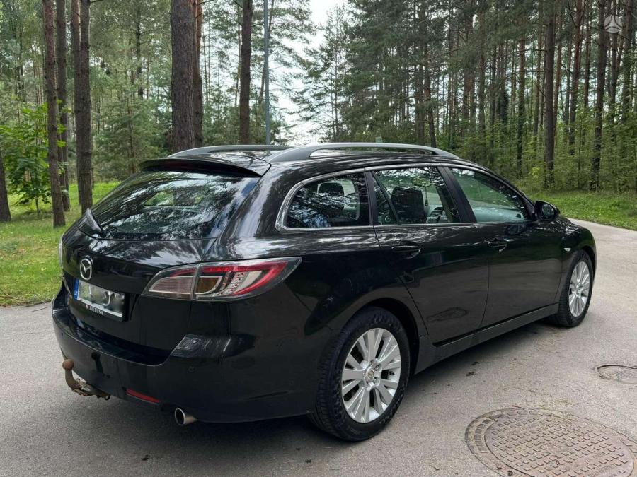 Black Mazda 6 2010 in Vilnius, with an engine capacity of 2.00 L and mileage of 300 thousand km for 2450 €, photo 3 on AUTOMOTO.COM.LV