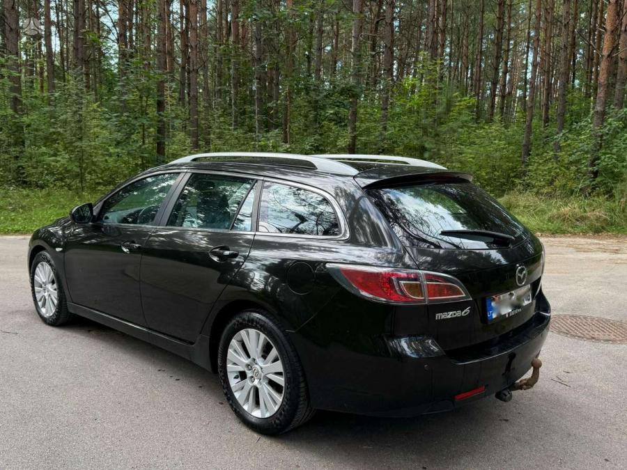 Black Mazda 6 2010 in Vilnius, with an engine capacity of 2.00 L and mileage of 300 thousand km for 2450 €, photo 5 on AUTOMOTO.COM.LV