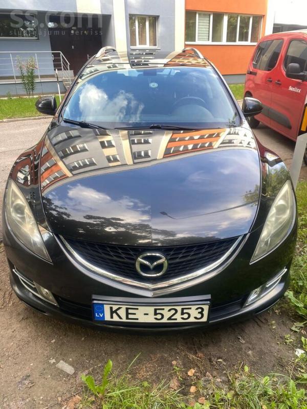 Black Mazda 6 2010 in Riga, with an engine capacity of 2.20 L and mileage of 236 thousand km for 3100 €, photo 1 on AUTOMOTO.COM.LV