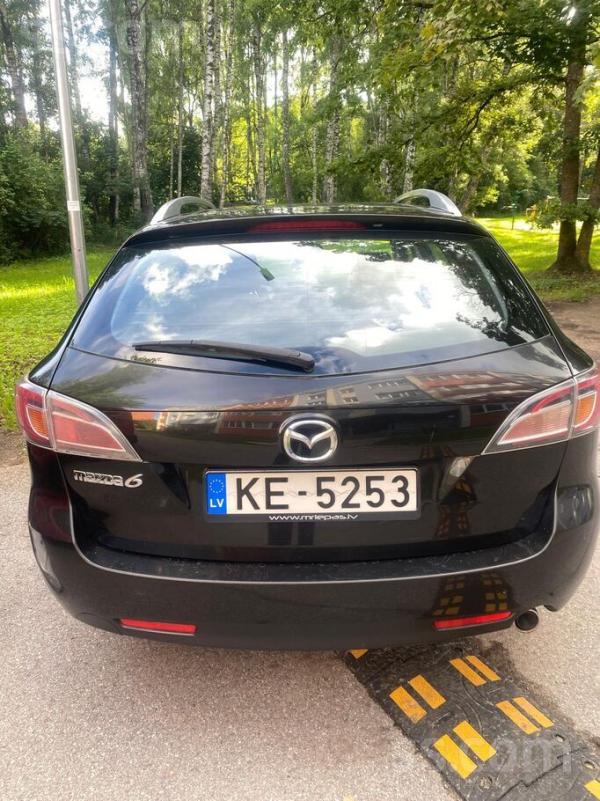 Black Mazda 6 2010 in Riga, with an engine capacity of 2.20 L and mileage of 236 thousand km for 3100 €, photo 4 on AUTOMOTO.COM.LV