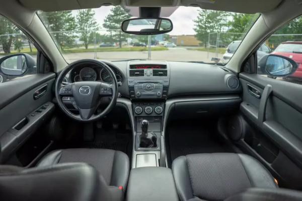 Black Mazda 6 2011 in Liepaja, with an engine capacity of 2.20 L and mileage of 197 thousand km for 4250 €, photo 8 on AUTOMOTO.COM.LV