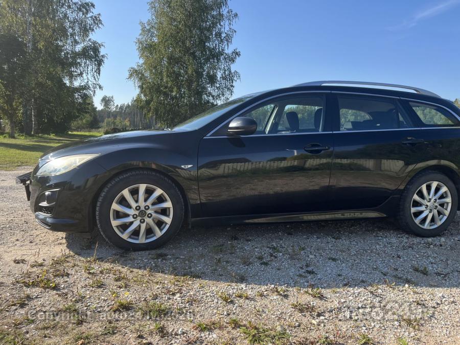 Black Mazda 6 2011 in Tartu, with an engine capacity of 2.20 L and mileage of 310 thousand km for 3900 €, photo 4 on AUTOMOTO.COM.LV