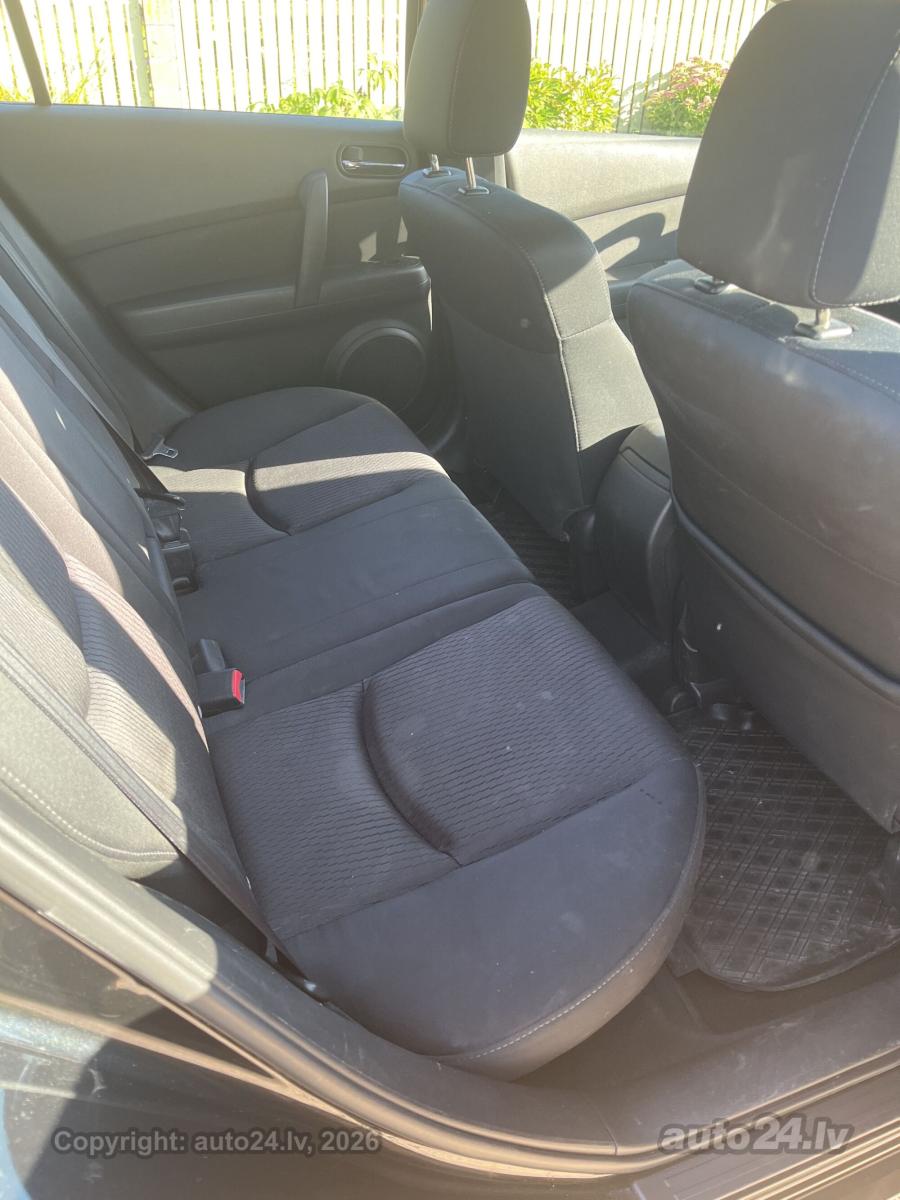 Black Mazda 6 2011 in Tartu, with an engine capacity of 2.20 L and mileage of 310 thousand km for 3900 €, photo 7 on AUTOMOTO.COM.LV