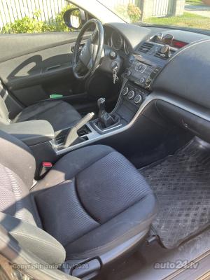 Black Mazda 6 2011 in Tartu, with an engine capacity of 2.20 L and mileage of 310 thousand km for 3900 €, photo 8 on AUTOMOTO.COM.LV