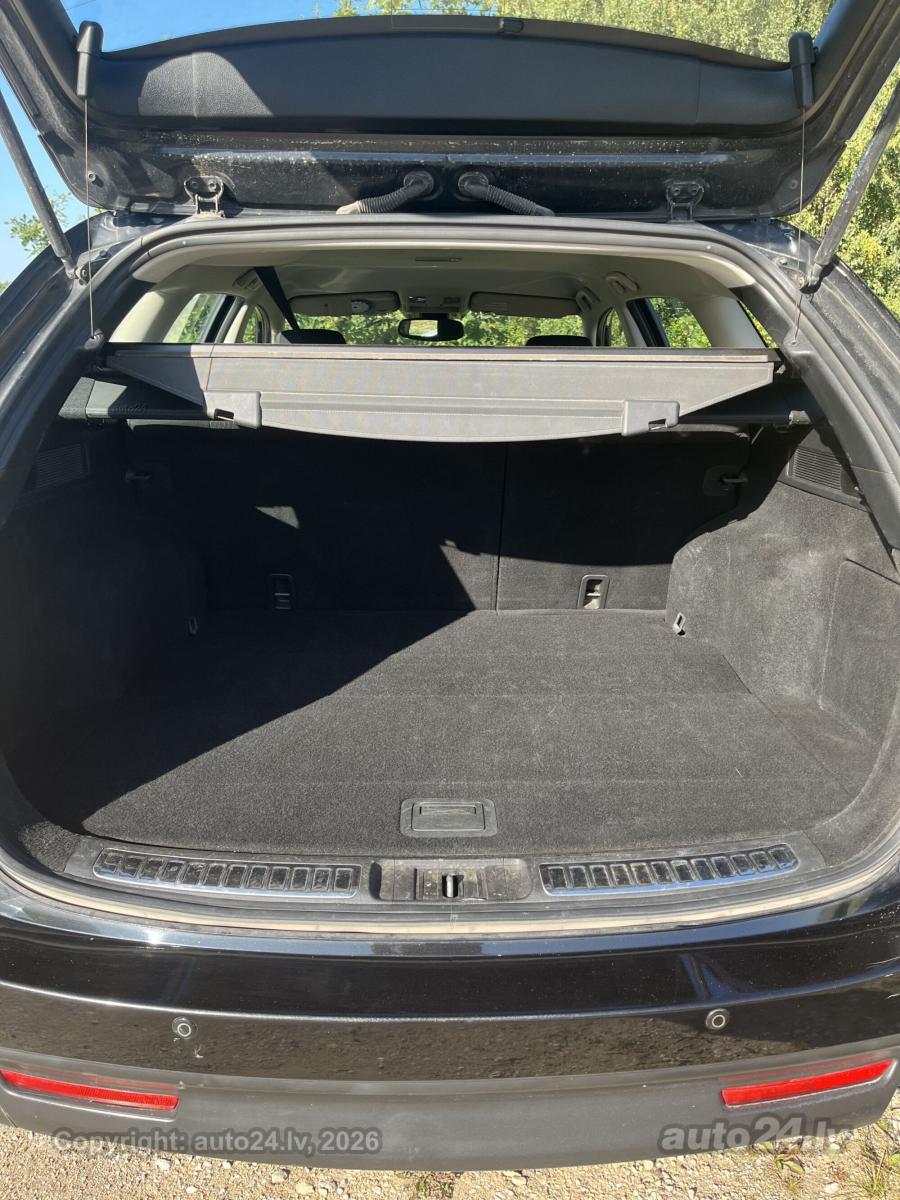 Black Mazda 6 2011 in Tartu, with an engine capacity of 2.20 L and mileage of 310 thousand km for 3900 €, photo 9 on AUTOMOTO.COM.LV