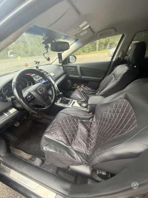 Black Mazda 6 2011 in Vilnius, with an engine capacity of 2.18 L and mileage of 394 thousand km for 3000 €, photo 17 on AUTOMOTO.COM.LV