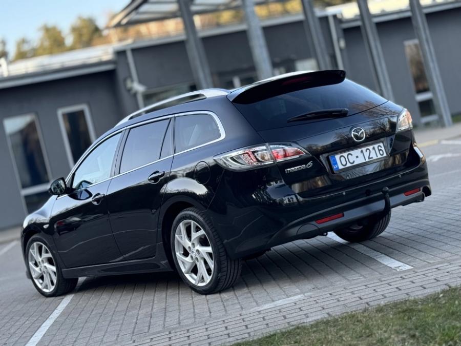 Black Mazda 6 2012 in Riga, with an engine capacity of 2.20 L and mileage of 255 thousand km for 4590 €, photo 5 on AUTOMOTO.COM.LV