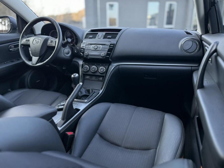 Black Mazda 6 2012 in Riga, with an engine capacity of 2.20 L and mileage of 255 thousand km for 4590 €, photo 7 on AUTOMOTO.COM.LV