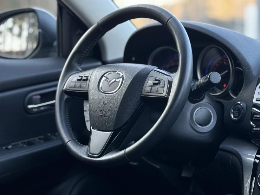 Black Mazda 6 2012 in Riga, with an engine capacity of 2.20 L and mileage of 255 thousand km for 4590 €, photo 14 on AUTOMOTO.COM.LV