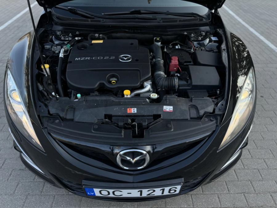 Black Mazda 6 2012 in Riga, with an engine capacity of 2.20 L and mileage of 255 thousand km for 4590 €, photo 26 on AUTOMOTO.COM.LV