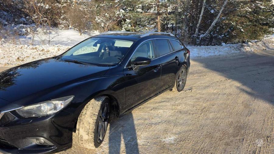 Black Mazda 6 2013 in Vilnius, with an engine capacity of 2.18 L and mileage of 255 thousand km for 5499 €, photo 6 on AUTOMOTO.COM.LV