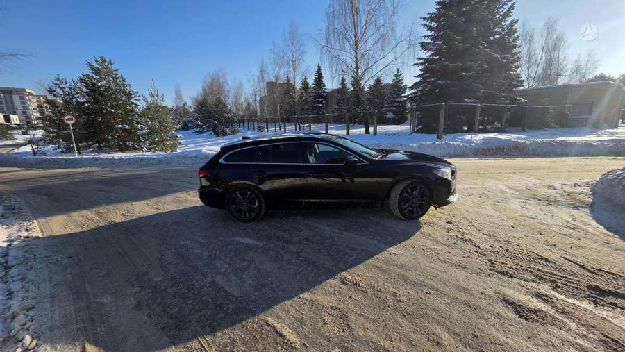 Black Mazda 6 2013 in Vilnius, with an engine capacity of 2.18 L and mileage of 255 thousand km for 5499 €, photo 14 on AUTOMOTO.COM.LV
