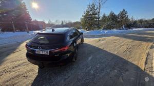 Black Mazda 6 2013 in Vilnius, with an engine capacity of 2.18 L and mileage of 255 thousand km for 5499 €, photo 16 on AUTOMOTO.COM.LV