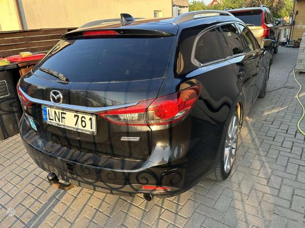 Black Mazda 6 2013 in Klaipeda, with an engine capacity of 2.18 L and mileage of 281 thousand km for 3200 €, photo 4 on AUTOMOTO.COM.LV