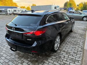 Black Mazda 6 2013 in Parnu, with an engine capacity of 2.20 L and mileage of 230 thousand km for 5750 €, photo 5 on AUTOMOTO.COM.LV