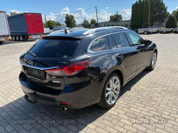 Black Mazda 6 2013 in Parnu, with an engine capacity of 2.20 L and mileage of 230 thousand km for 5750 €, photo 4 on AUTOMOTO.COM.LV