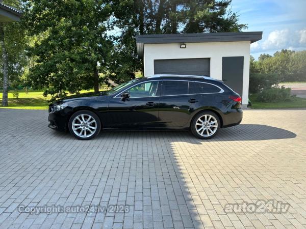 Black Mazda 6 2013 in Parnu, with an engine capacity of 2.20 L and mileage of 235 thousand km for 6250 €, photo 3 on AUTOMOTO.COM.LV