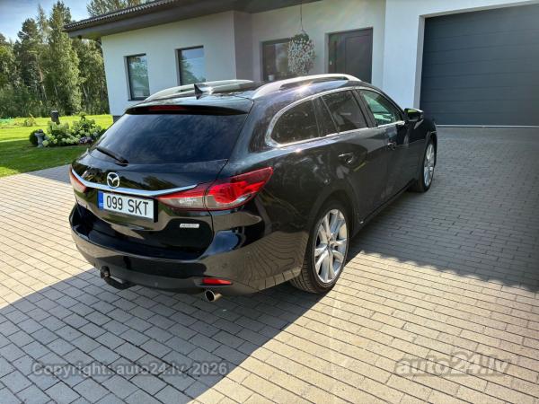 Black Mazda 6 2013 in Parnu, with an engine capacity of 2.20 L and mileage of 235 thousand km for 6250 €, photo 5 on AUTOMOTO.COM.LV