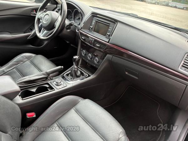 Black Mazda 6 2013 in Parnu, with an engine capacity of 2.20 L and mileage of 235 thousand km for 6250 €, photo 6 on AUTOMOTO.COM.LV
