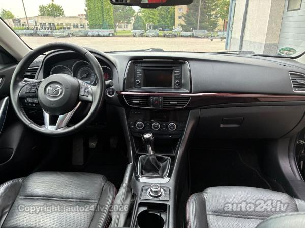Black Mazda 6 2013 in Parnu, with an engine capacity of 2.20 L and mileage of 235 thousand km for 6250 €, photo 7 on AUTOMOTO.COM.LV
