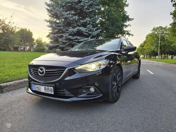 Black Mazda 6 2013 in Panevezys, with an engine capacity of 2.18 L and mileage of 218 thousand km for 5200 €, photo 3 on AUTOMOTO.COM.LV