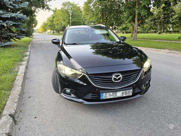 Black Mazda 6 2013 in Panevezys, with an engine capacity of 2.18 L and mileage of 218 thousand km for 5200 €, photo 4 on AUTOMOTO.COM.LV