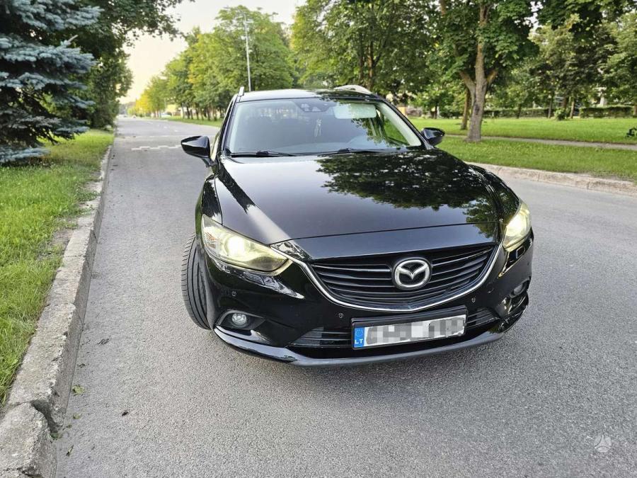 Black Mazda 6 2013 in Panevezys, with an engine capacity of 2.18 L and mileage of 218 thousand km for 5200 €, photo 4 on AUTOMOTO.COM.LV