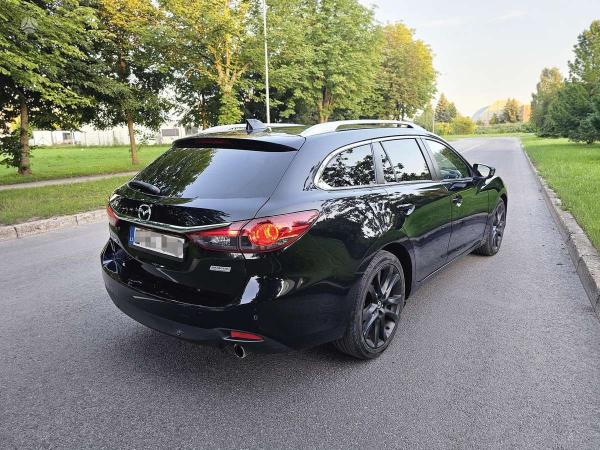 Black Mazda 6 2013 in Panevezys, with an engine capacity of 2.18 L and mileage of 218 thousand km for 5200 €, photo 6 on AUTOMOTO.COM.LV