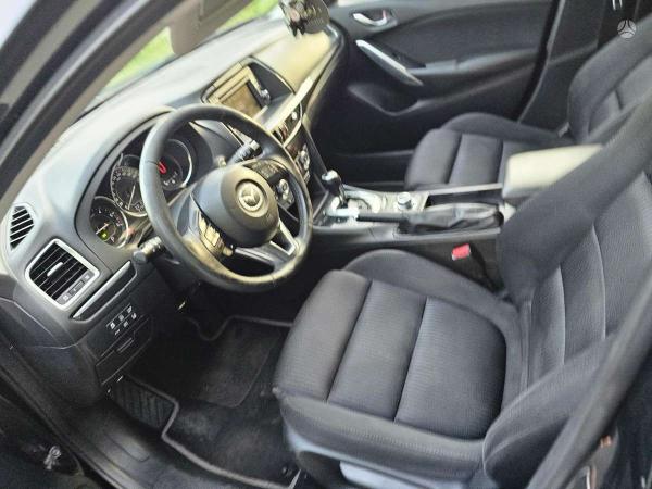 Black Mazda 6 2013 in Panevezys, with an engine capacity of 2.18 L and mileage of 218 thousand km for 5200 €, photo 9 on AUTOMOTO.COM.LV