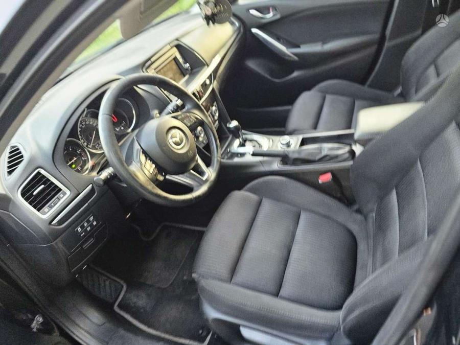 Black Mazda 6 2013 in Panevezys, with an engine capacity of 2.18 L and mileage of 218 thousand km for 5200 €, photo 9 on AUTOMOTO.COM.LV