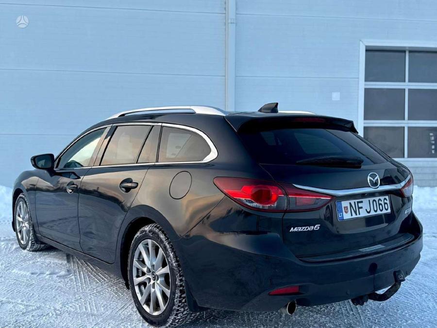 Black Mazda 6 2014 in Vilnius, with an engine capacity of 2.19 L and mileage of 248 thousand km for 4400 €, photo 4 on AUTOMOTO.COM.LV