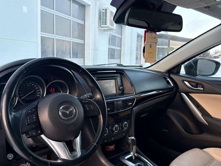 Black Mazda 6 2014 in Vilnius, with an engine capacity of 2.19 L and mileage of 248 thousand km for 4400 €, photo 11 on AUTOMOTO.COM.LV