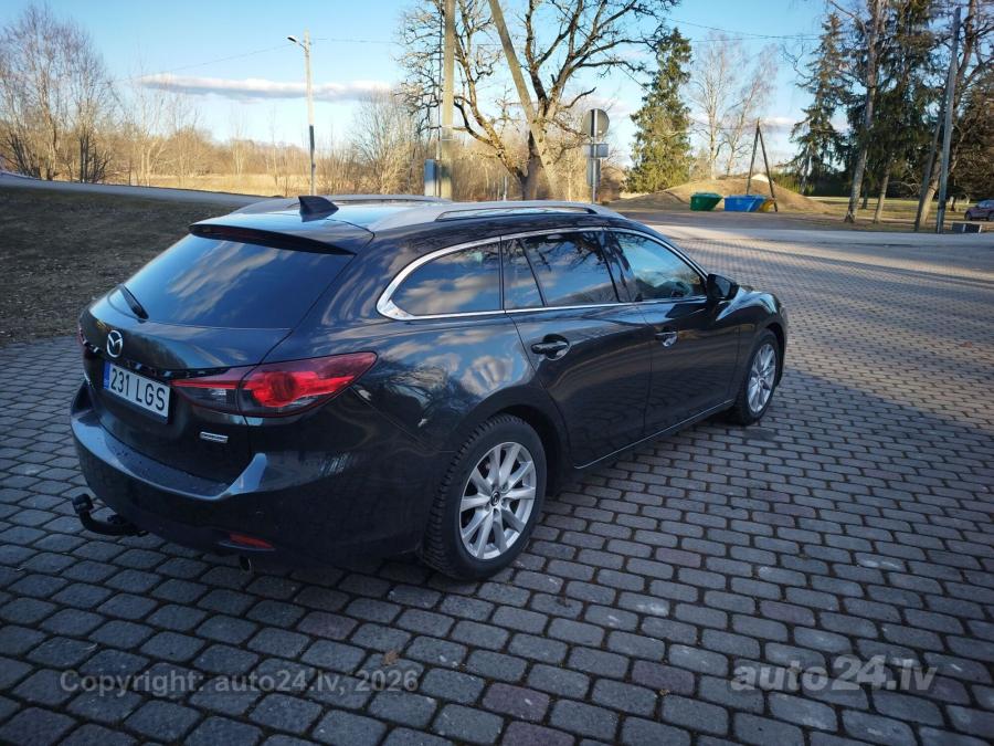 Black Mazda 6 2014 in Tallinn, with an engine capacity of 2.20 L and mileage of 318 thousand km for 6300 €, photo 6 on AUTOMOTO.COM.LV