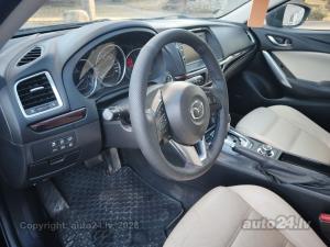 Black Mazda 6 2014 in Tallinn, with an engine capacity of 2.20 L and mileage of 318 thousand km for 6300 €, photo 15 on AUTOMOTO.COM.LV