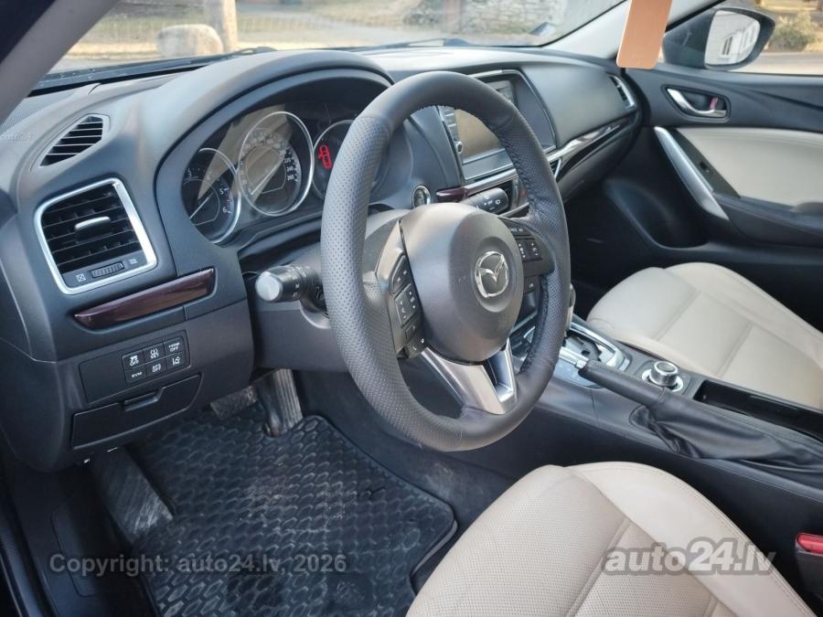 Black Mazda 6 2014 in Tallinn, with an engine capacity of 2.20 L and mileage of 318 thousand km for 6300 €, photo 15 on AUTOMOTO.COM.LV