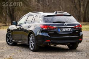 Black Mazda 6 2014 in Liepaja, with an engine capacity of 2.20 L and mileage of 236 thousand km for 6800 €, photo 3 on AUTOMOTO.COM.LV